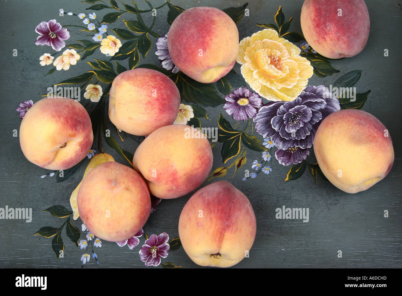 close up picture of peaches on a antique french decorated Wood Serving ...
