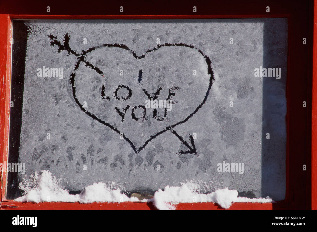 Heart carved into snow hi-res stock photography and images - Alamy