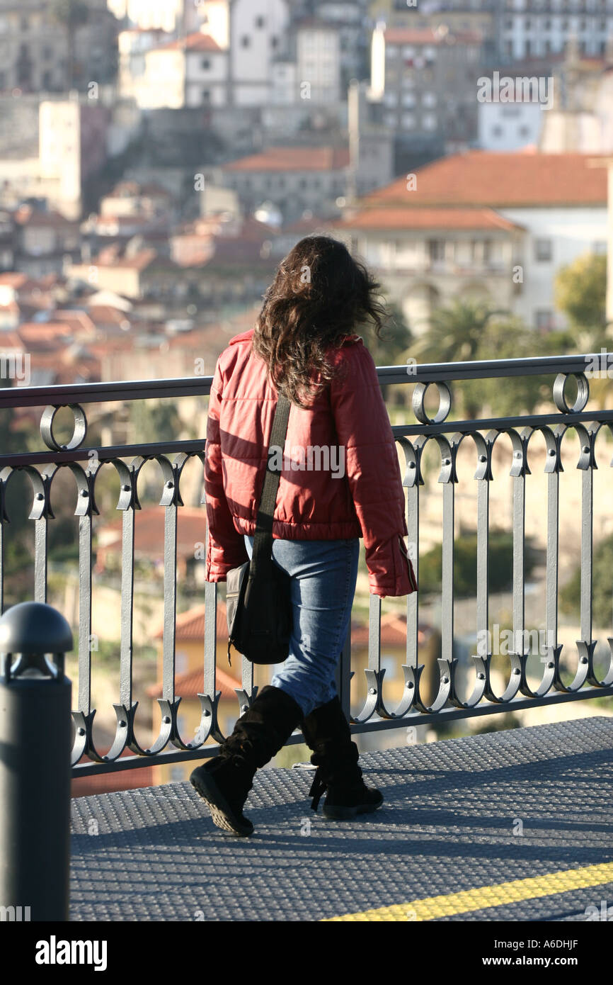 Oporto girl on a bridge Stock Photo - Alamy