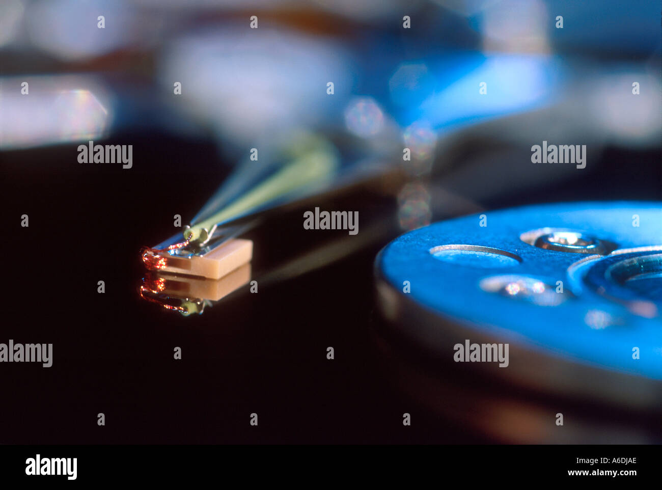 Computer technology hard drive platter and write read head Stock Photo ...