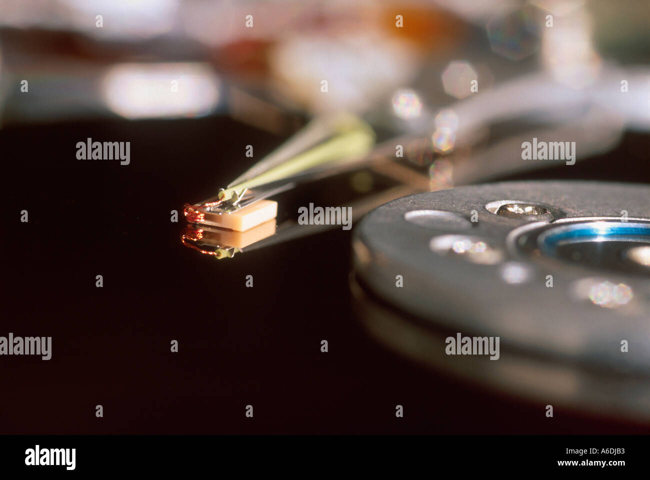 Computer technology hard drive platter and write read head Stock Photo ...