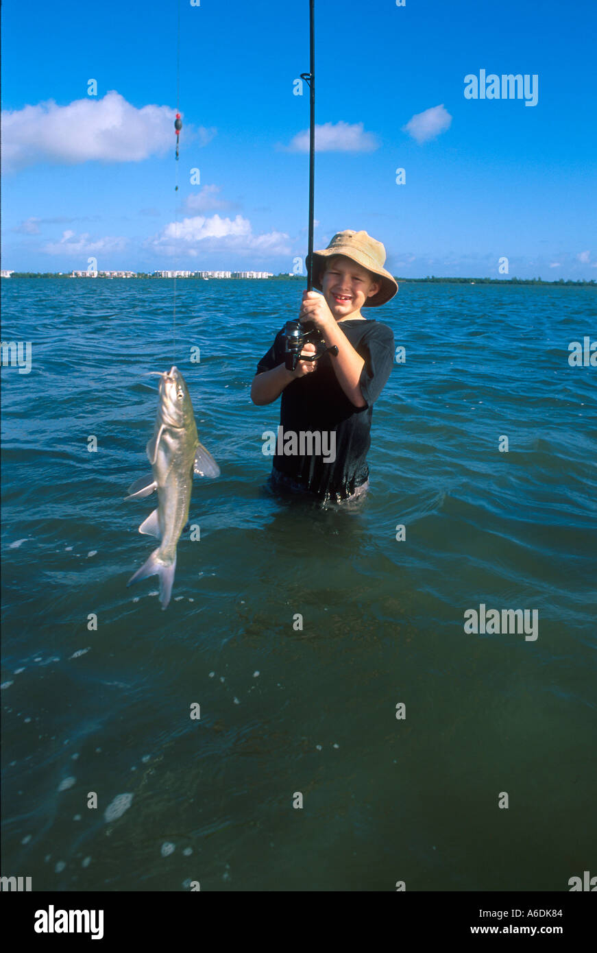 Boy with caught catfish while fishing First catch ever Saint Lucie ...