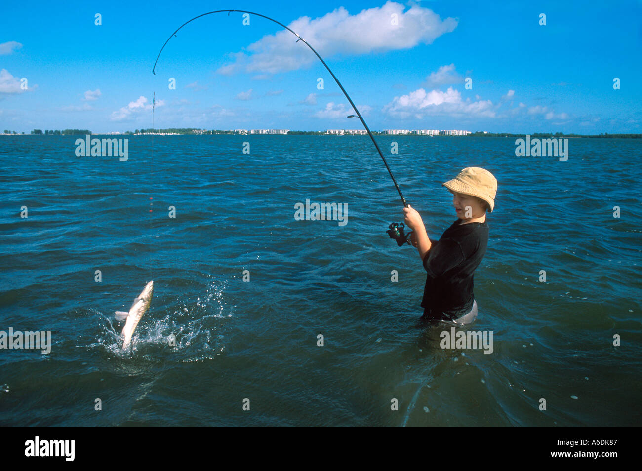 Boy with caught catfish while fishing First catch ever Saint Lucie ...