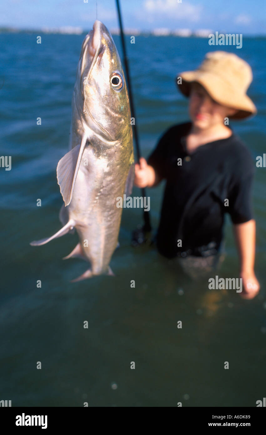 Boy with caught catfish while fishing First catch ever Saint Lucie ...