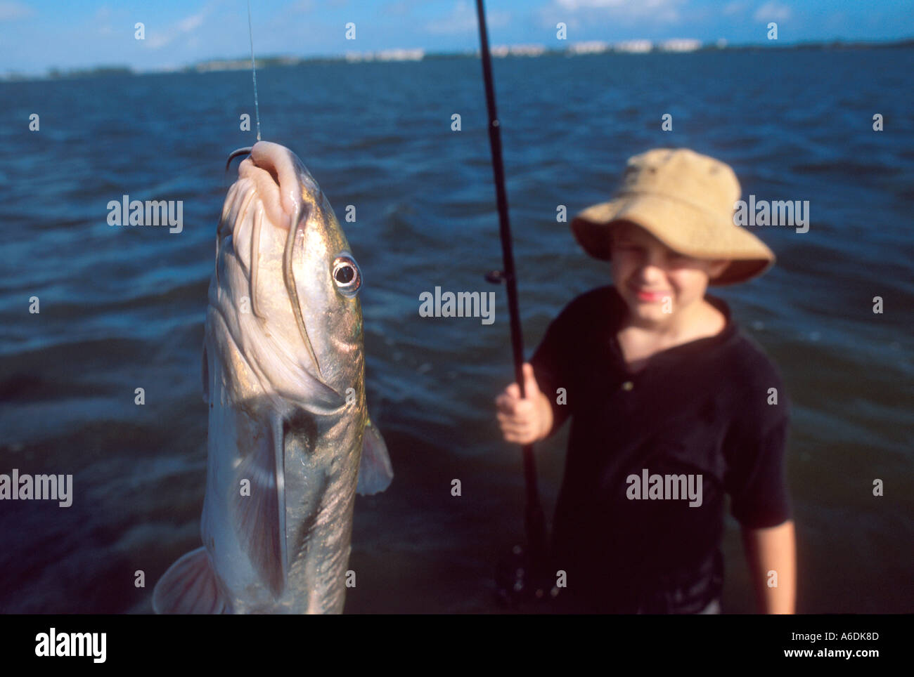 Boy with caught catfish while fishing First catch ever Saint Lucie ...