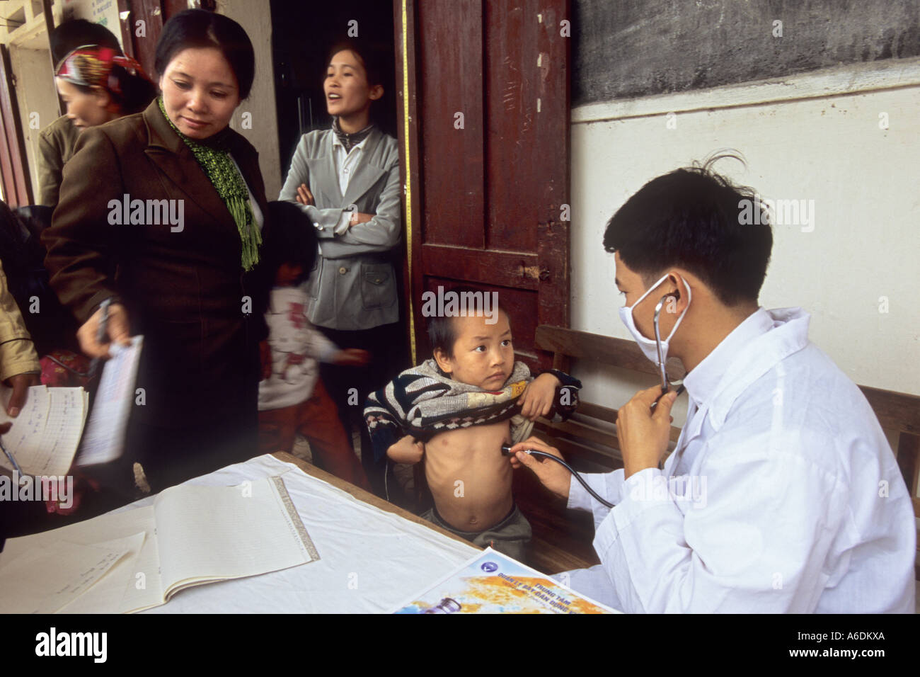 Children being examined Commune health care Phuc Linh Commune Health ...
