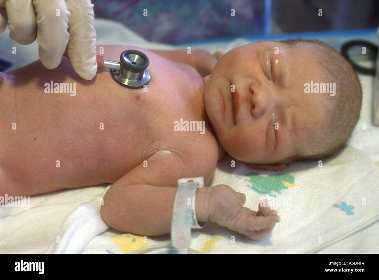 Newborn baby boy receives a checkup after birth Stock Photo - Alamy