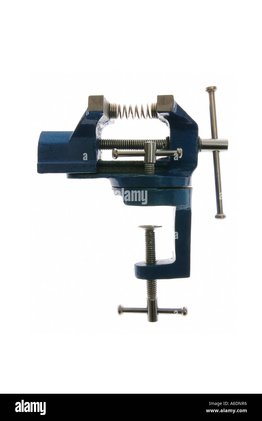 Vice gripping a spring back-lit on a white background Stock Photo - Alamy