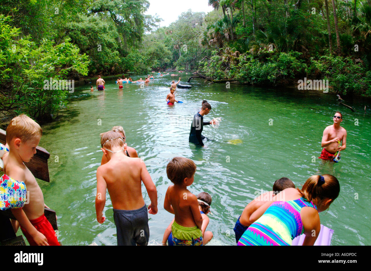 People enjoying the water near the spring head Blue Spring State Park ...