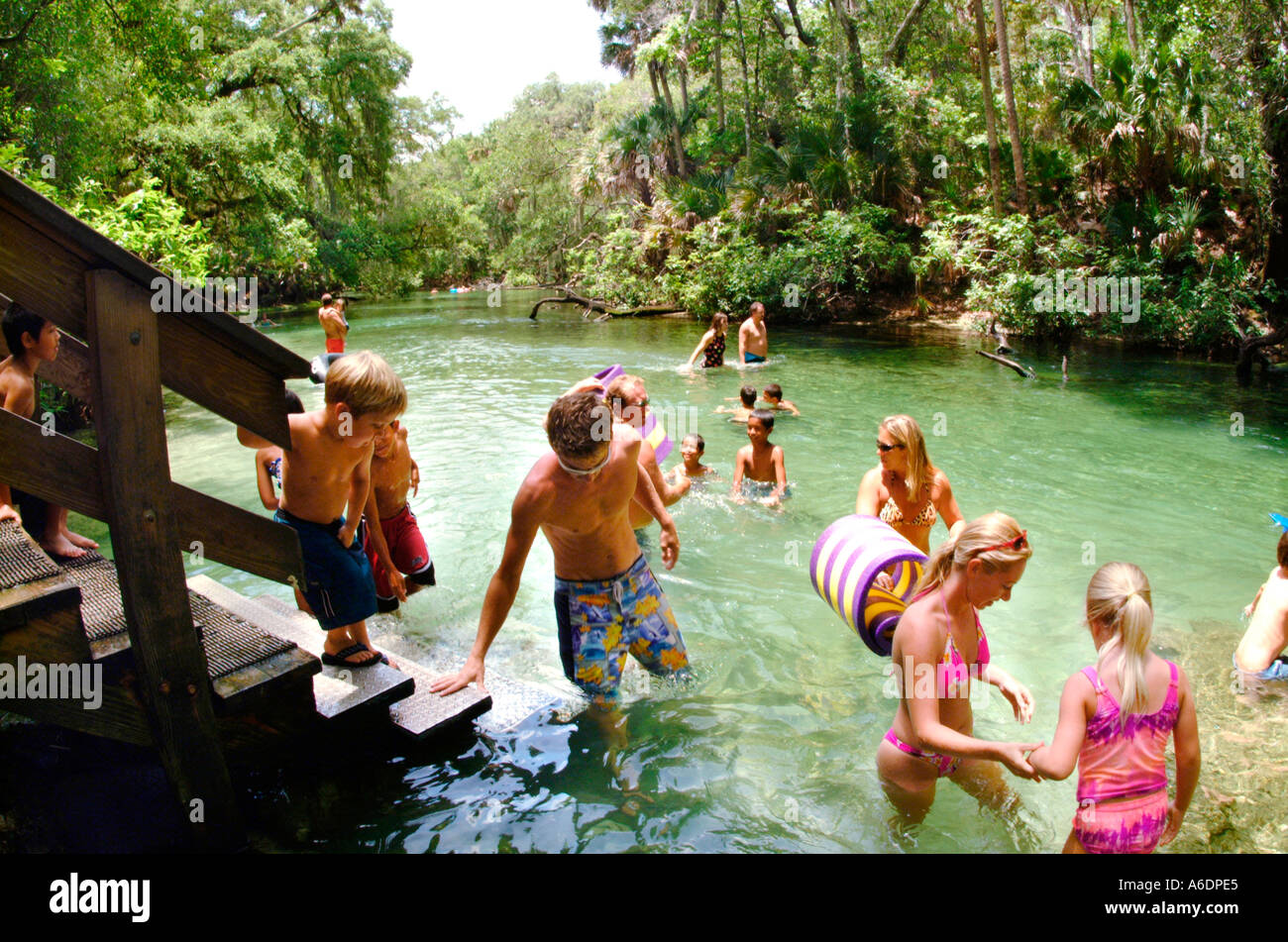 People enjoying the water near the spring head Blue Spring State Park ...