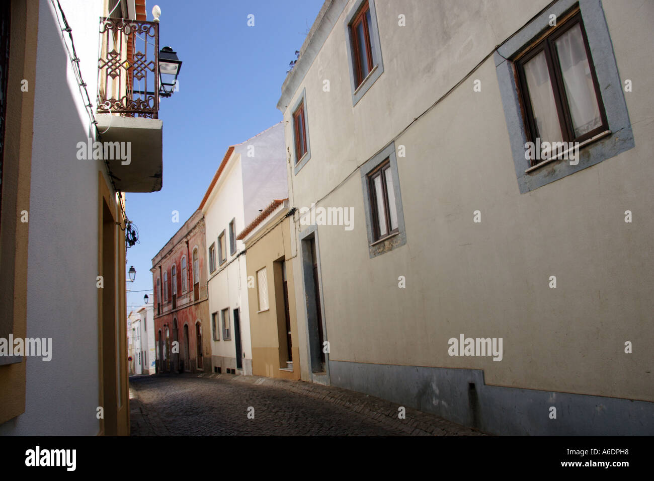 Cobbled street in the old part of Sines a small coastal fishing town in ...