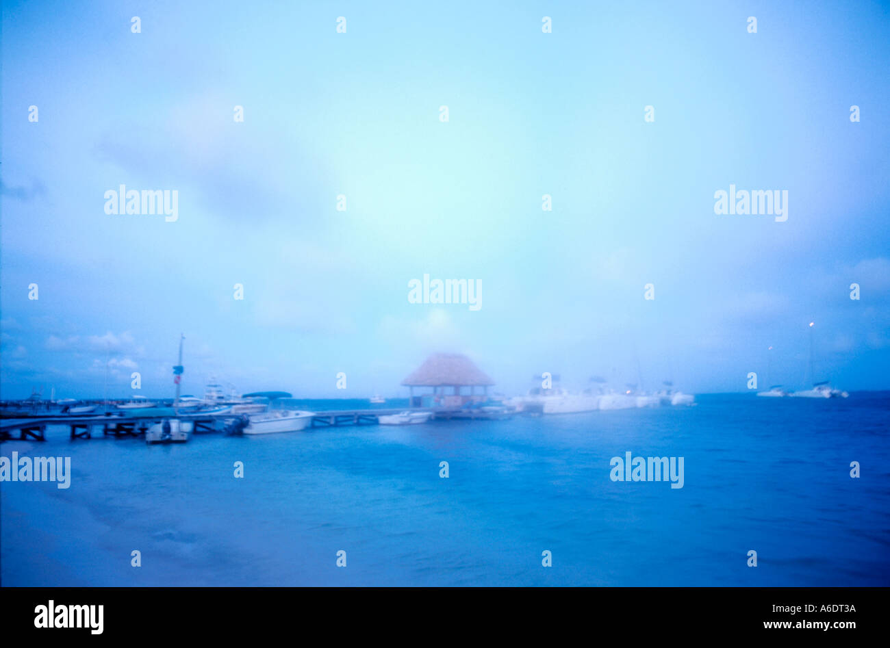 Early morning fog Ambergris Caye Belize boating tropical Stock Photo ...