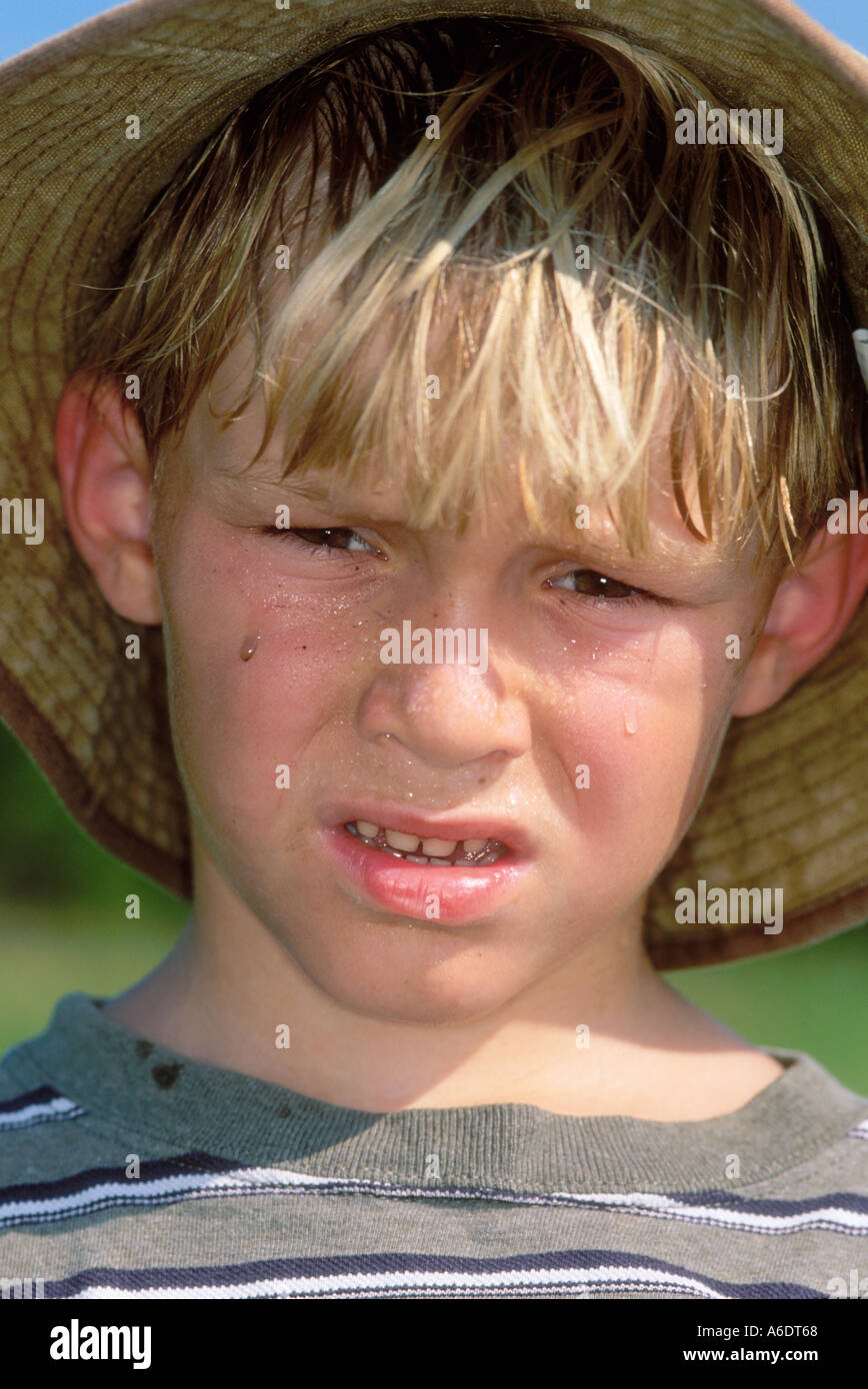 Child sweating hot hi-res stock photography and images - Alamy