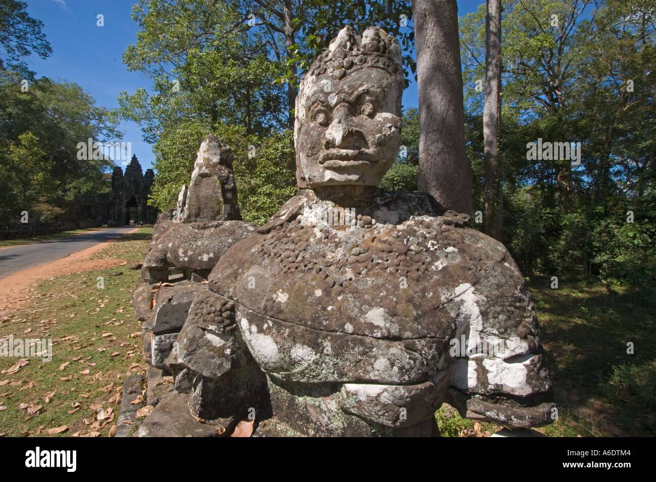 Asura of the South Gate naga bridge into the Angkor Thom complex at ...
