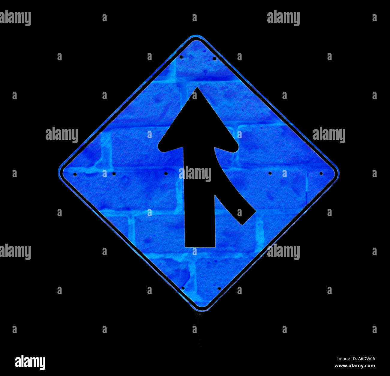 blue merge sign with bricks artistic Stock Photo - Alamy