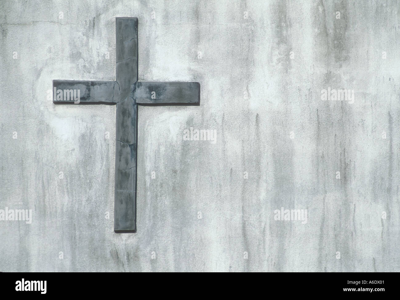 cross on the side of a crypt in the Key West cemetery Florida graveyard ...