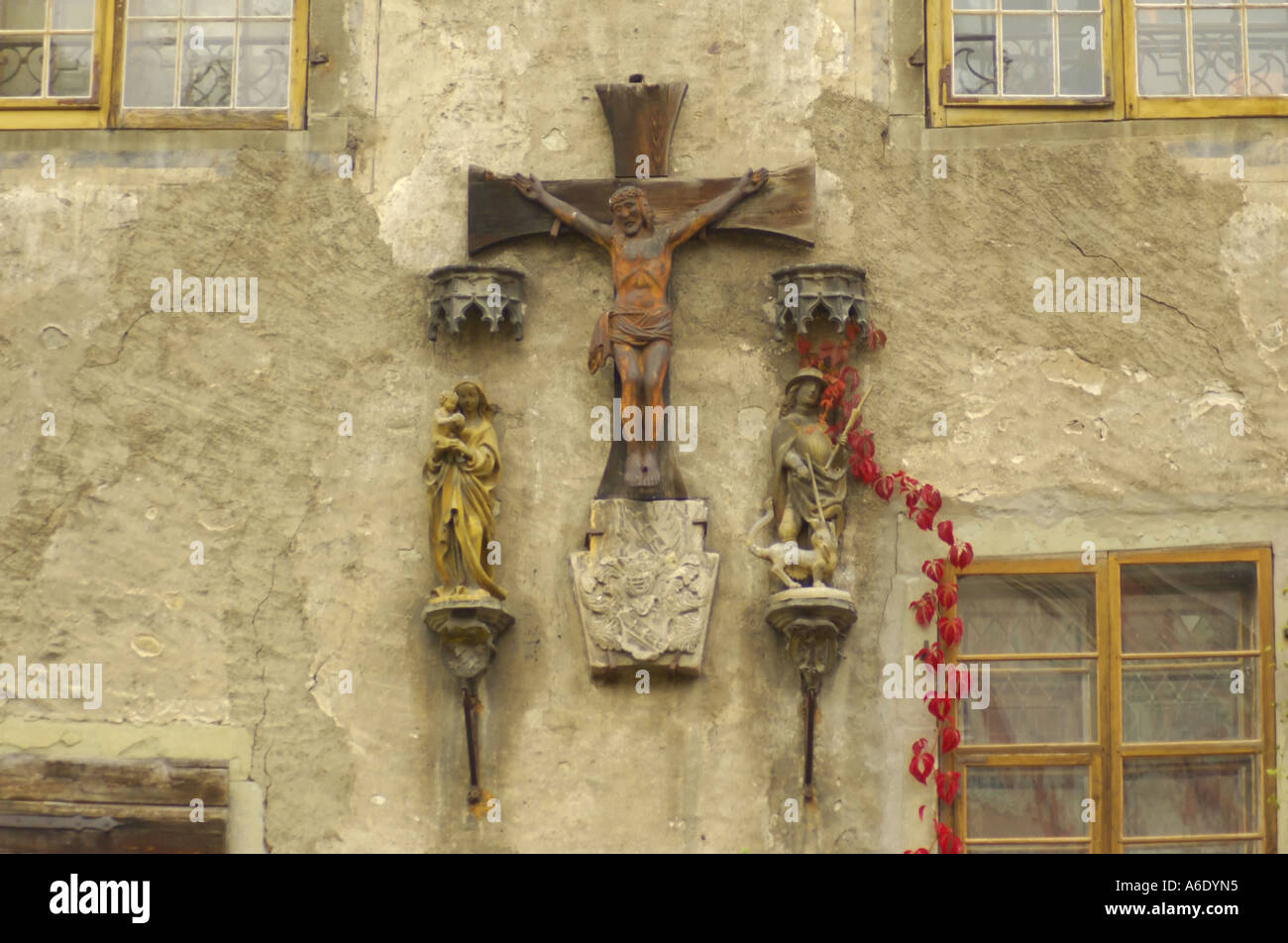 Religious symbols on the wall of the church in Meersburg Germany Stock ...