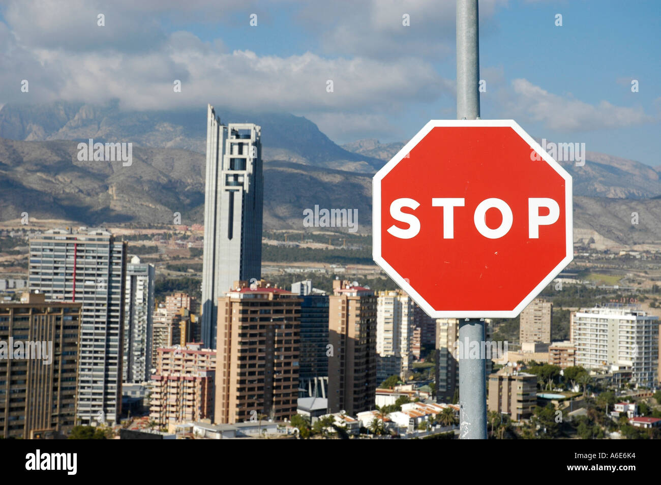 Stop sign in front of the city scape of Benidorm, Costa Blanca, Spain ...