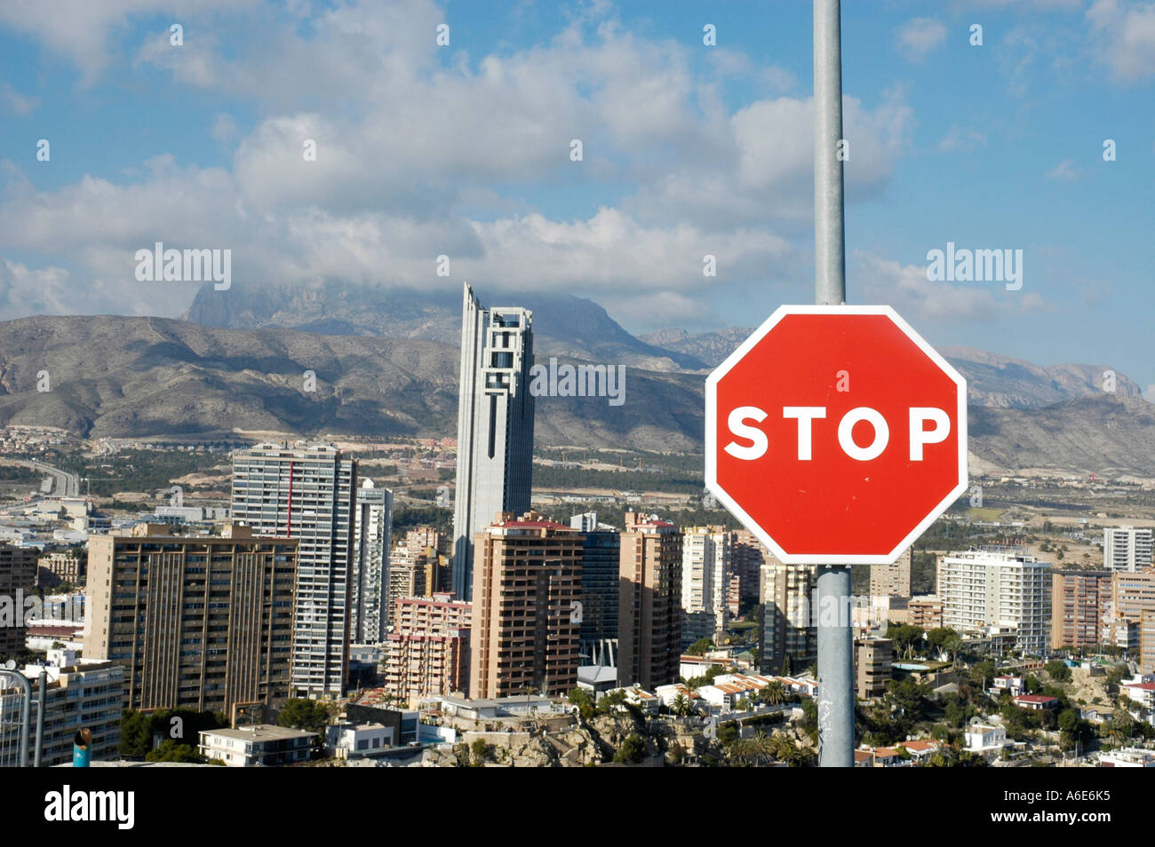 Stop sign in front of the city scape of Benidorm, Costa Blanca, Spain ...