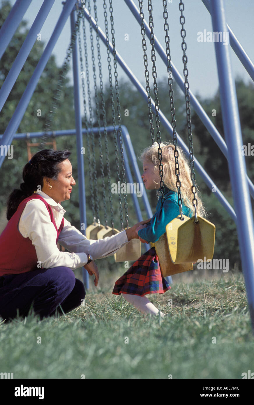 mother and child at a playground Stock Photo - Alamy