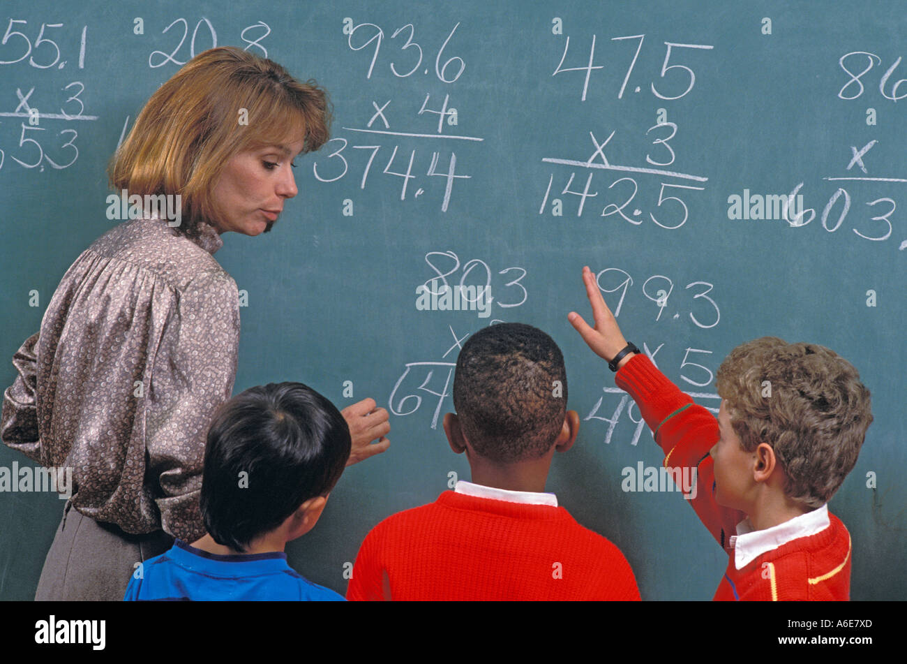 White teacher helping black student hi-res stock photography and images ...