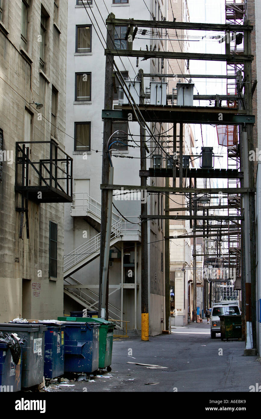 Narrow alley with electric cables between the houses in Vancouver ...