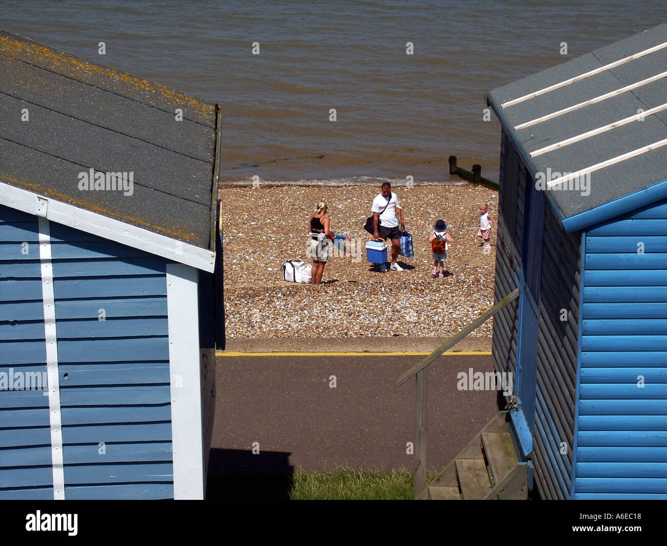 beach huts shingle beach whitstable kent england Stock Photo - Alamy