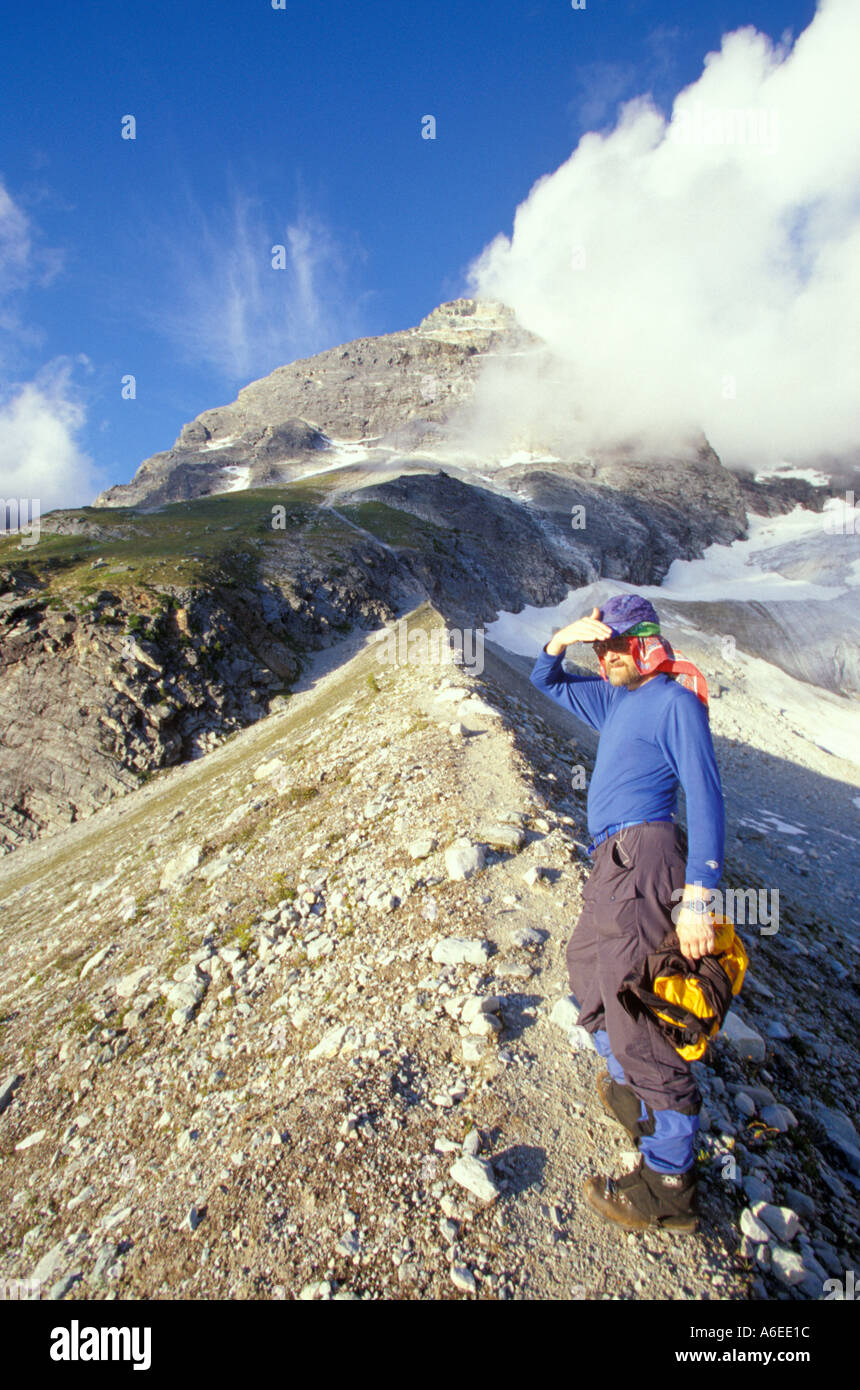 Climber on moraine below Mount Sir Donald Glacier National Park British ...