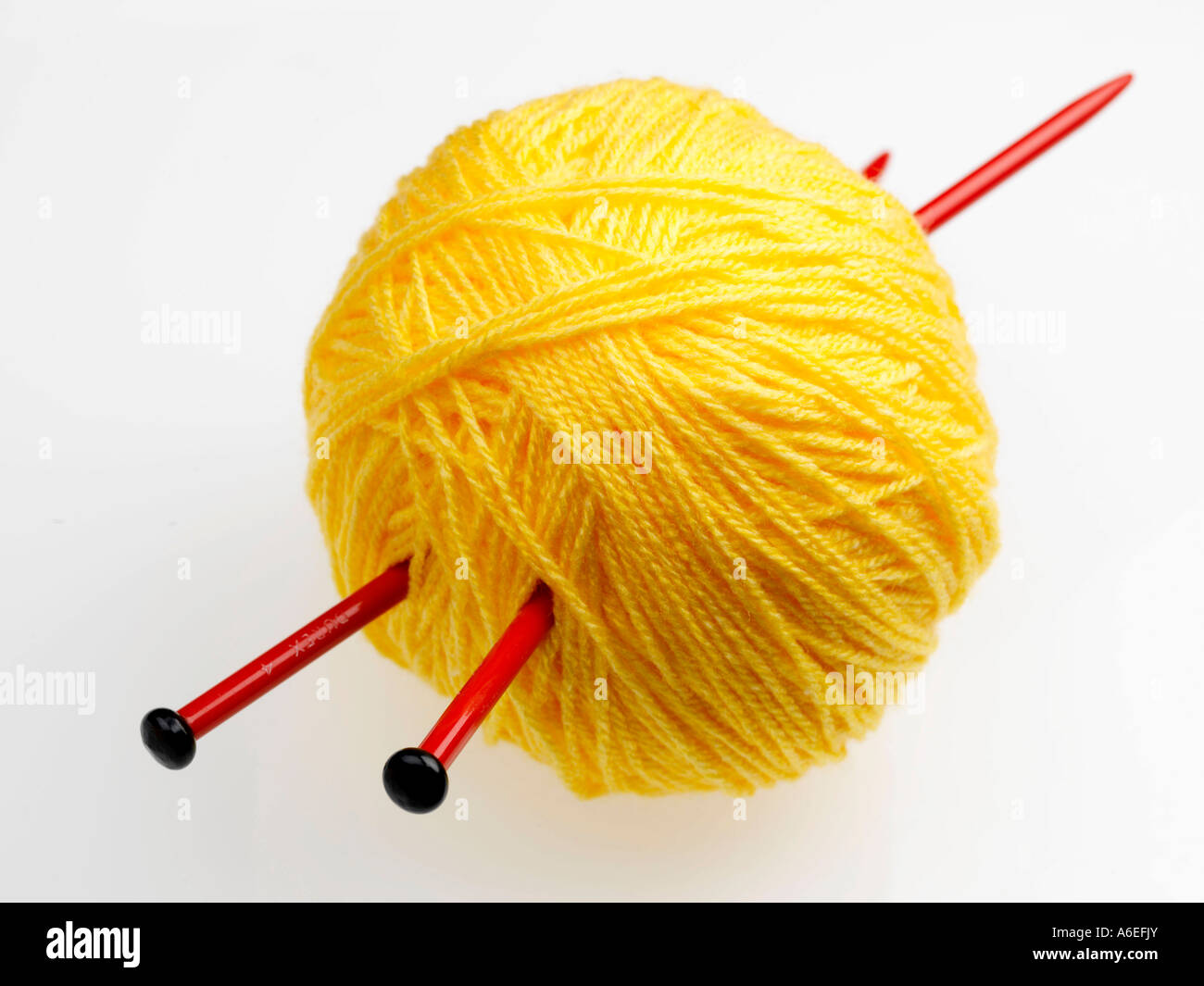 Ball of Yellow Knitting Wool Stock Photo - Alamy
