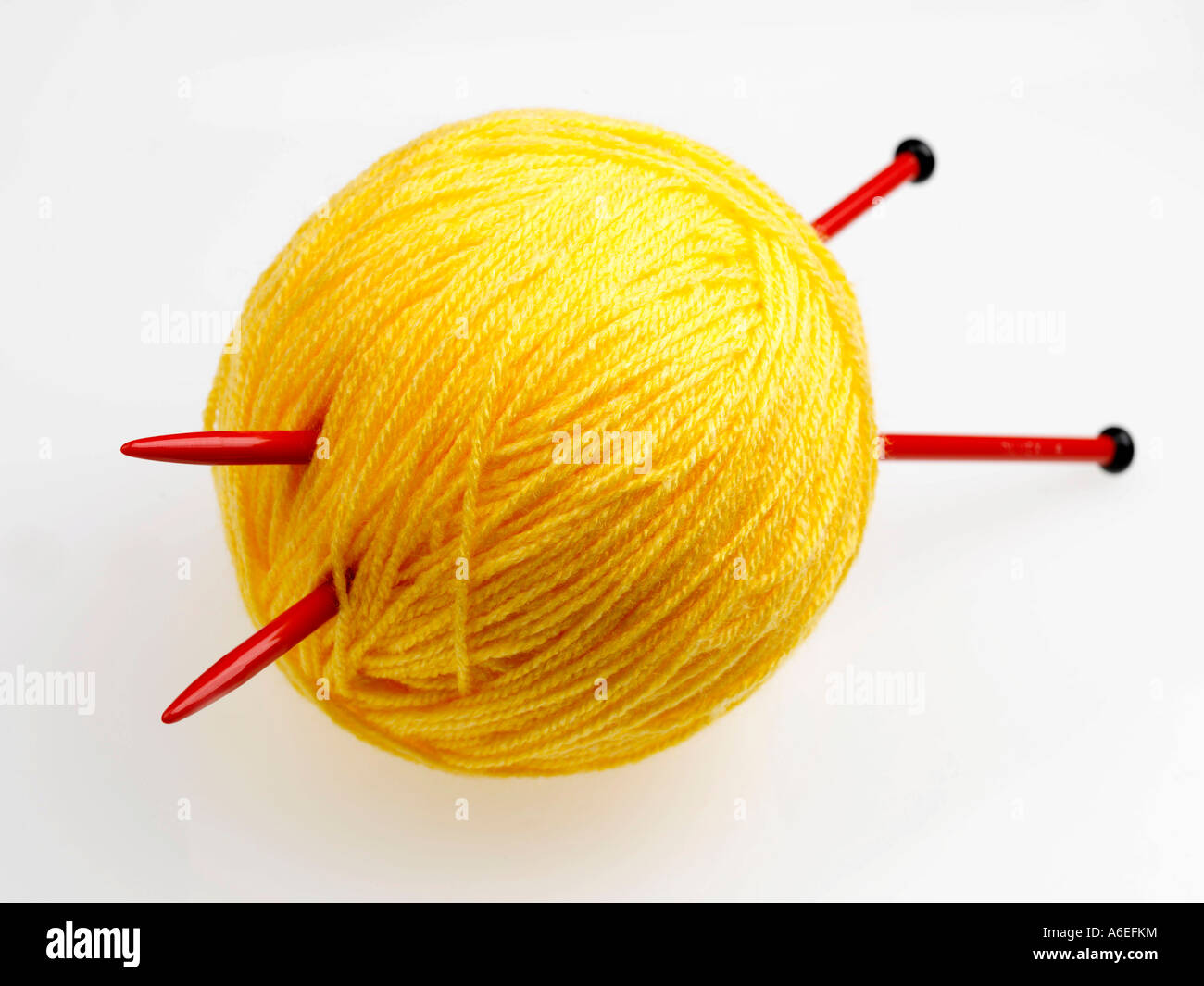 Ball of Yellow Knitting Wool Stock Photo - Alamy