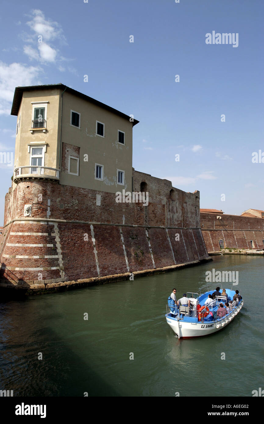 europe italy tuscany livorno a boat passing the Fortezza Vecchia Stock ...