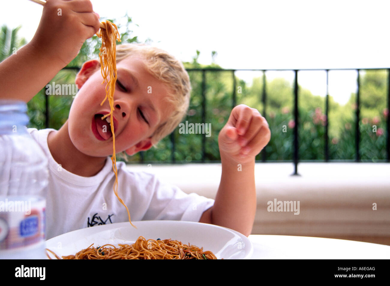 Young Boy Eating Spaghetti Bolognese Model Released Stock Photo - Alamy