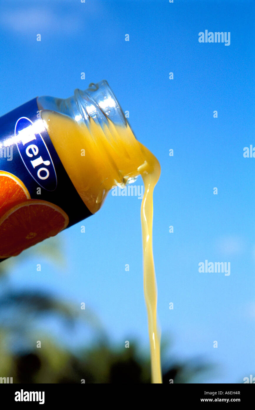 Pouring Orange Juice Stock Photo - Alamy