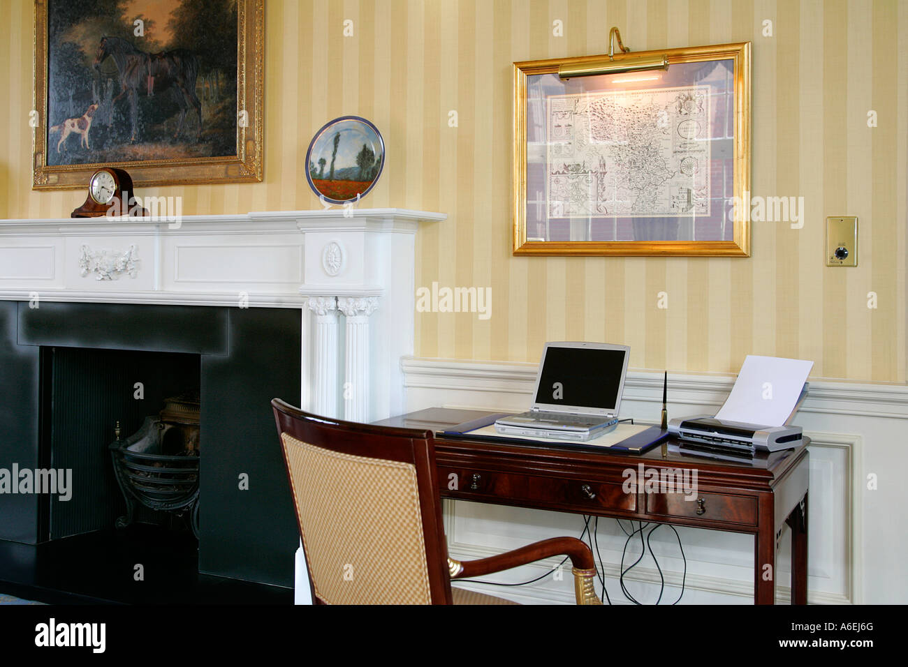 Laptop computer on hotel desk reception Stock Photo - Alamy