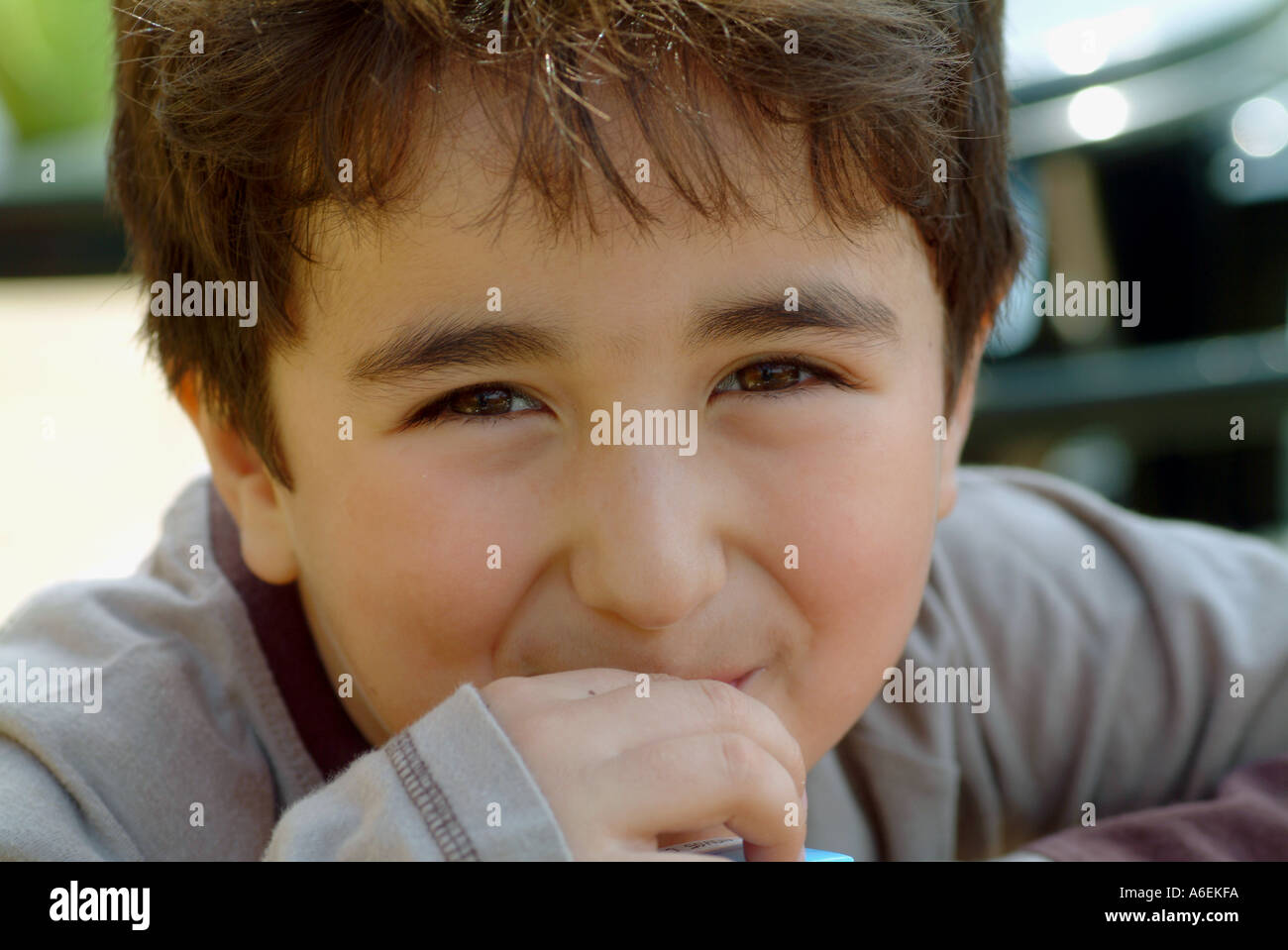 BOY SMILING AT CAMERA Stock Photo - Alamy