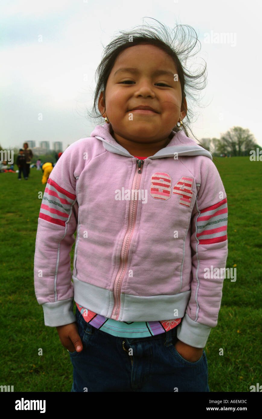 PERUVIAN GIRL POSING FOR THE CAMERA Stock Photo - Alamy