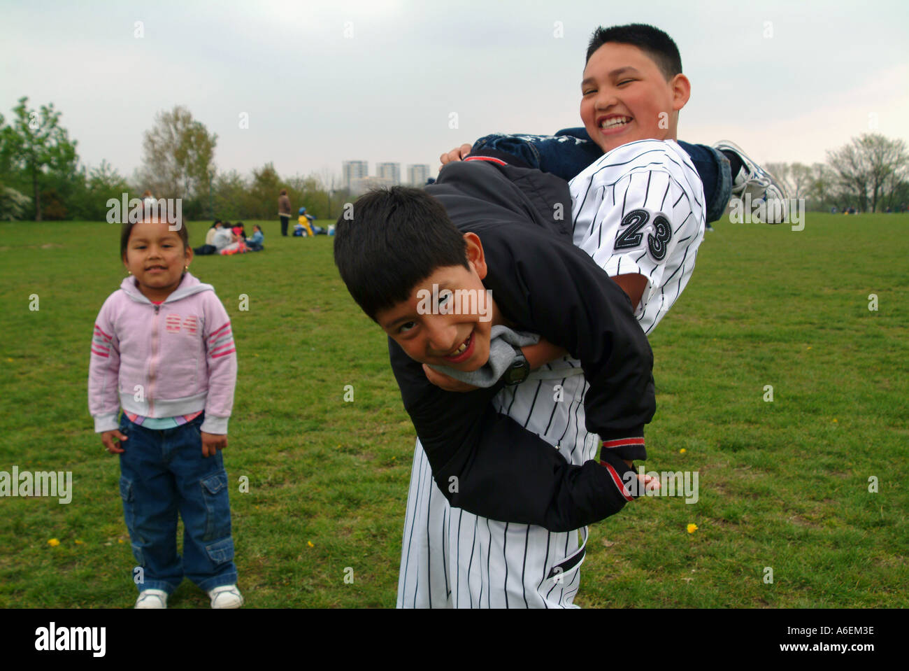 THREE PERUVIAN YOUNGSTERS PLAYING IN SOUTHWARK PARK 2005 Stock Photo ...