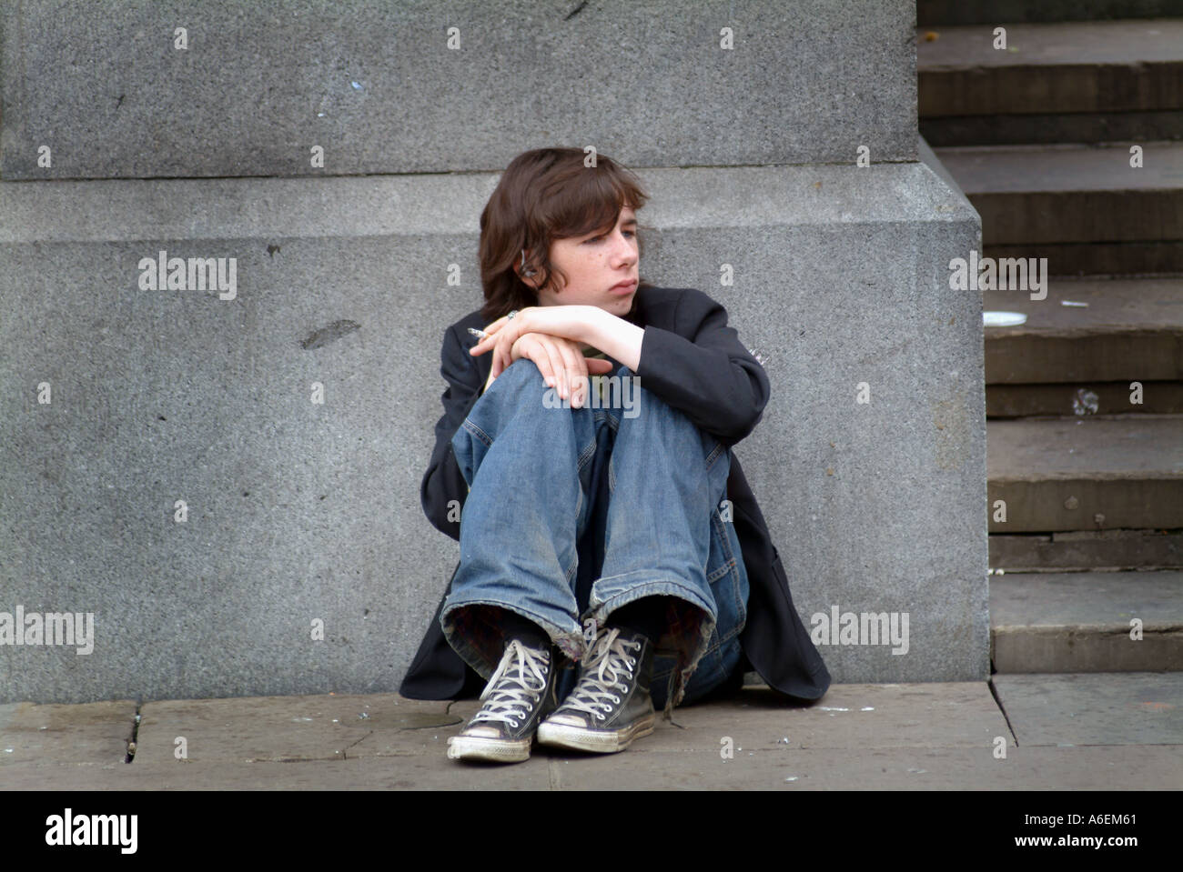 Student sitting in corner hi-res stock photography and images - Alamy