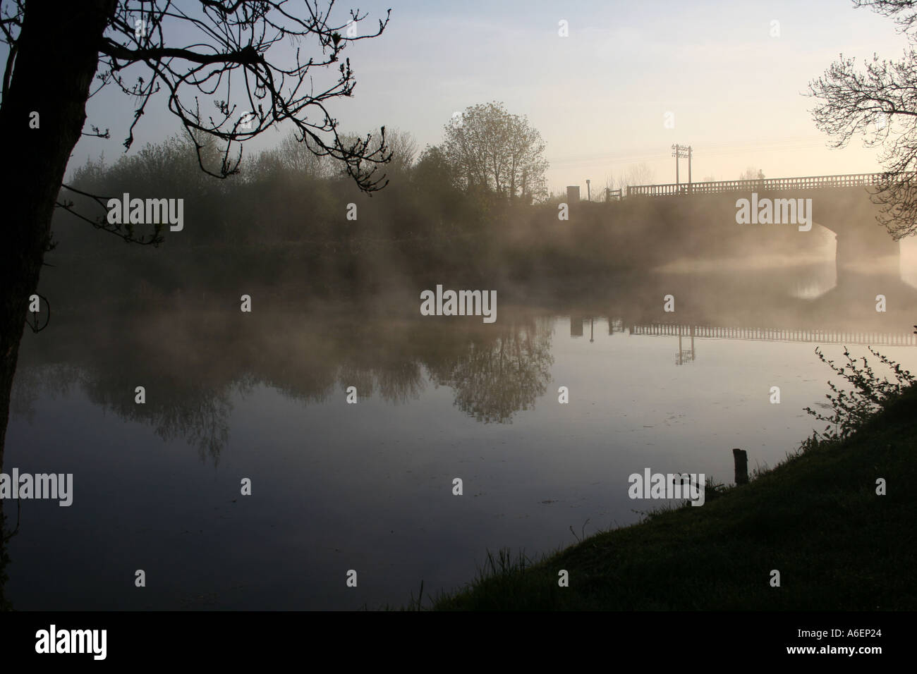 Mist rising from the water of the River Vendee, France. Image taken at ...