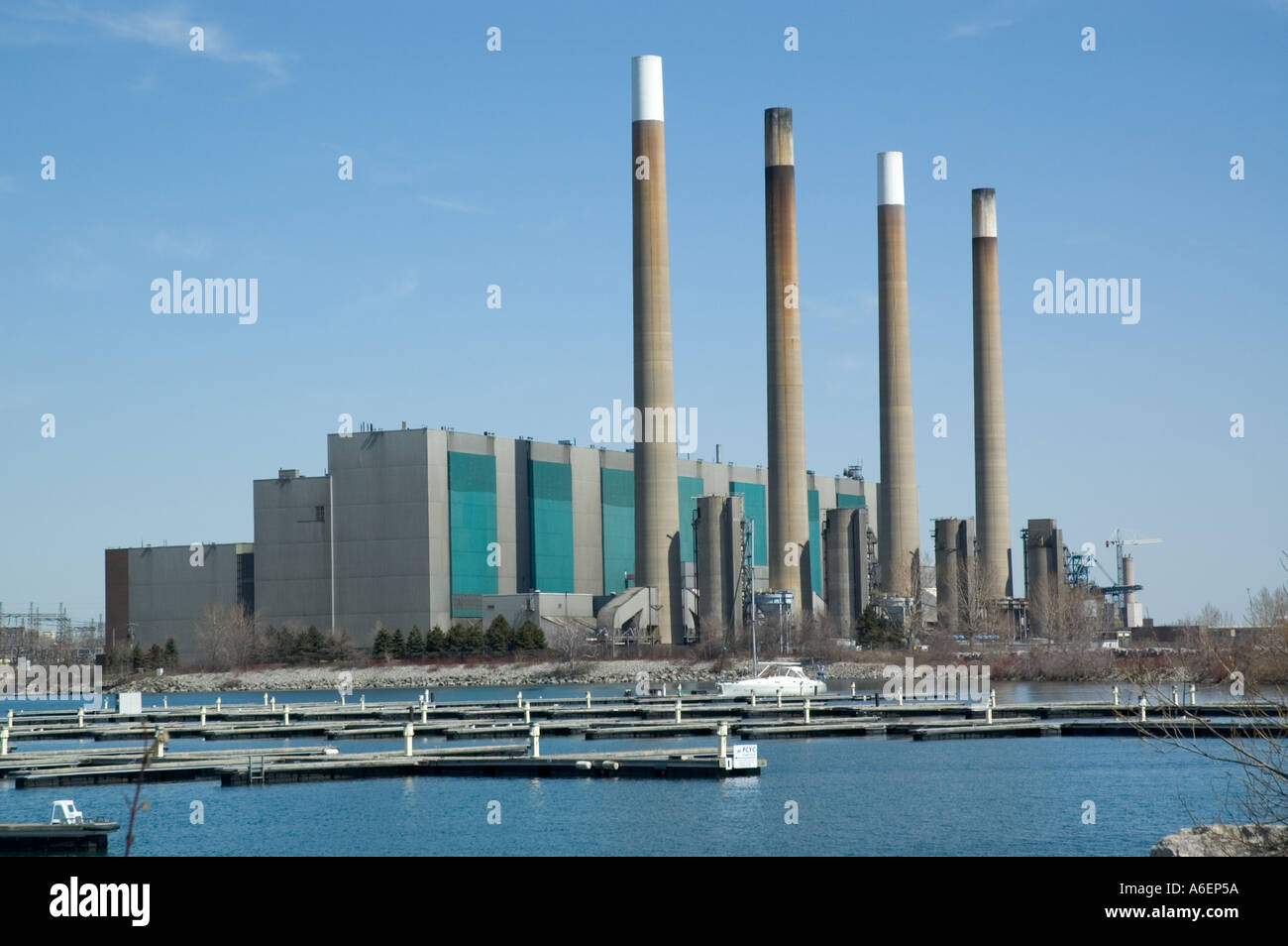 Four smoke stacks of a coal fire generating station Stock Photo - Alamy