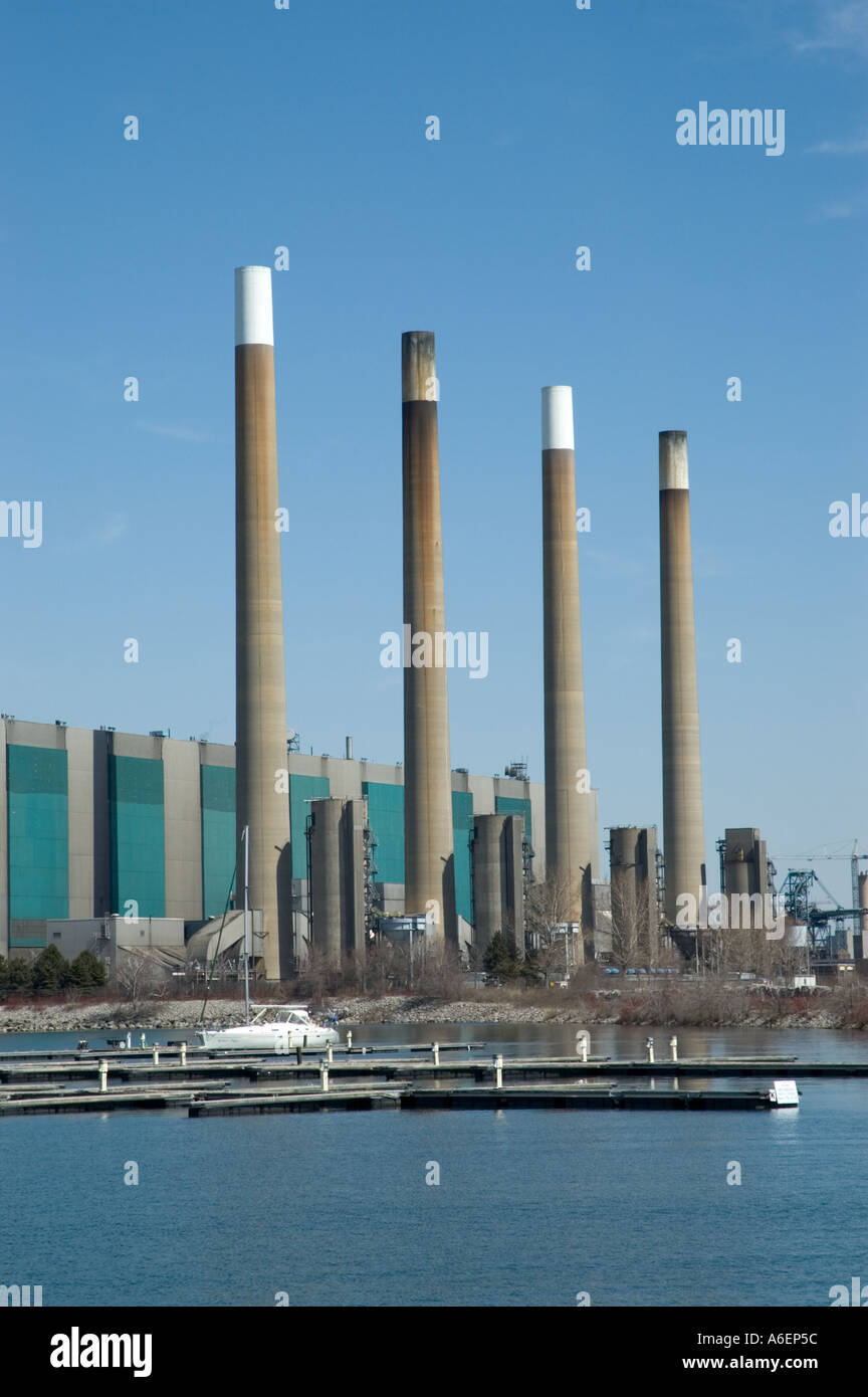 Four smoke stacks of a coal fire generating station Stock Photo - Alamy