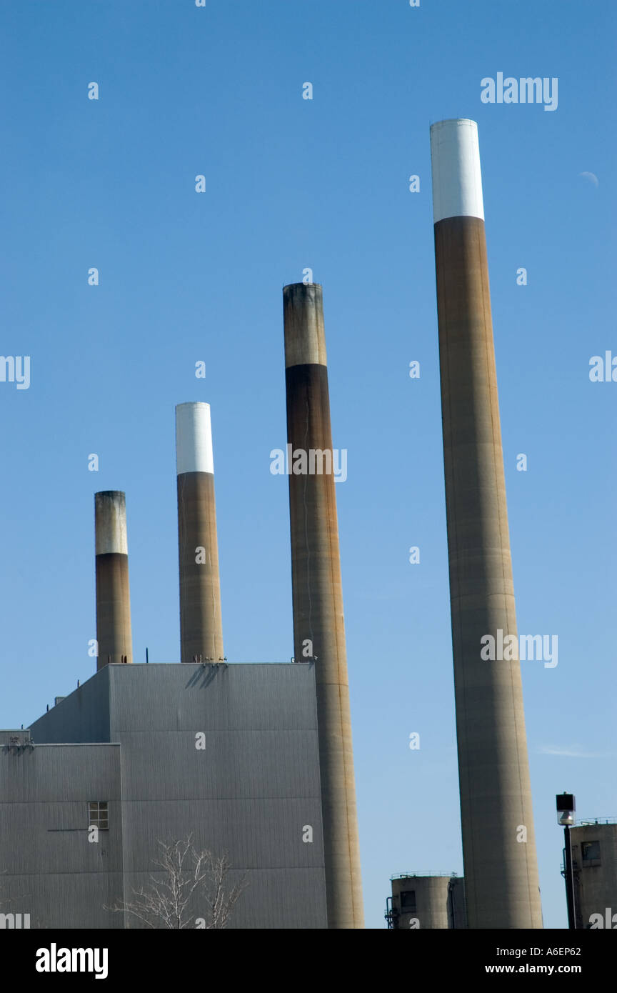 Four smoke stacks of a coal fire generating station Stock Photo - Alamy