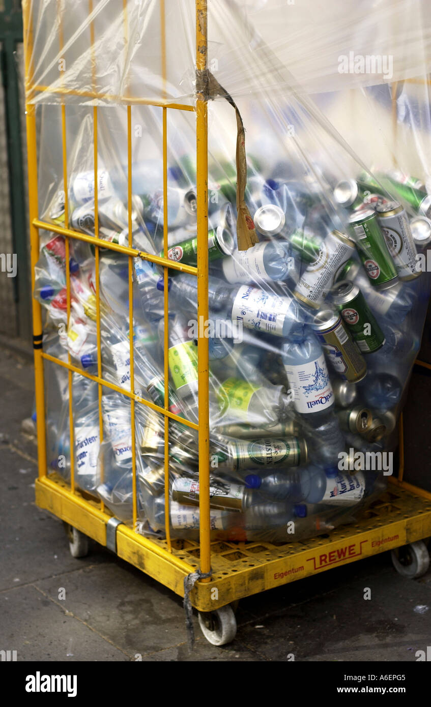 Pallet cage with empty can Stock Photo - Alamy