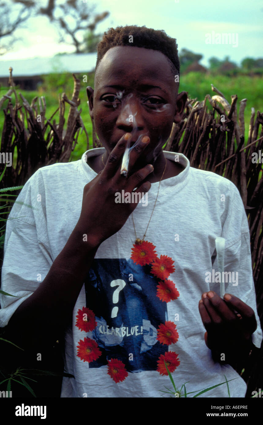 Young Gambian smoking a reefer on the Ginak Island Stock Photo - Alamy