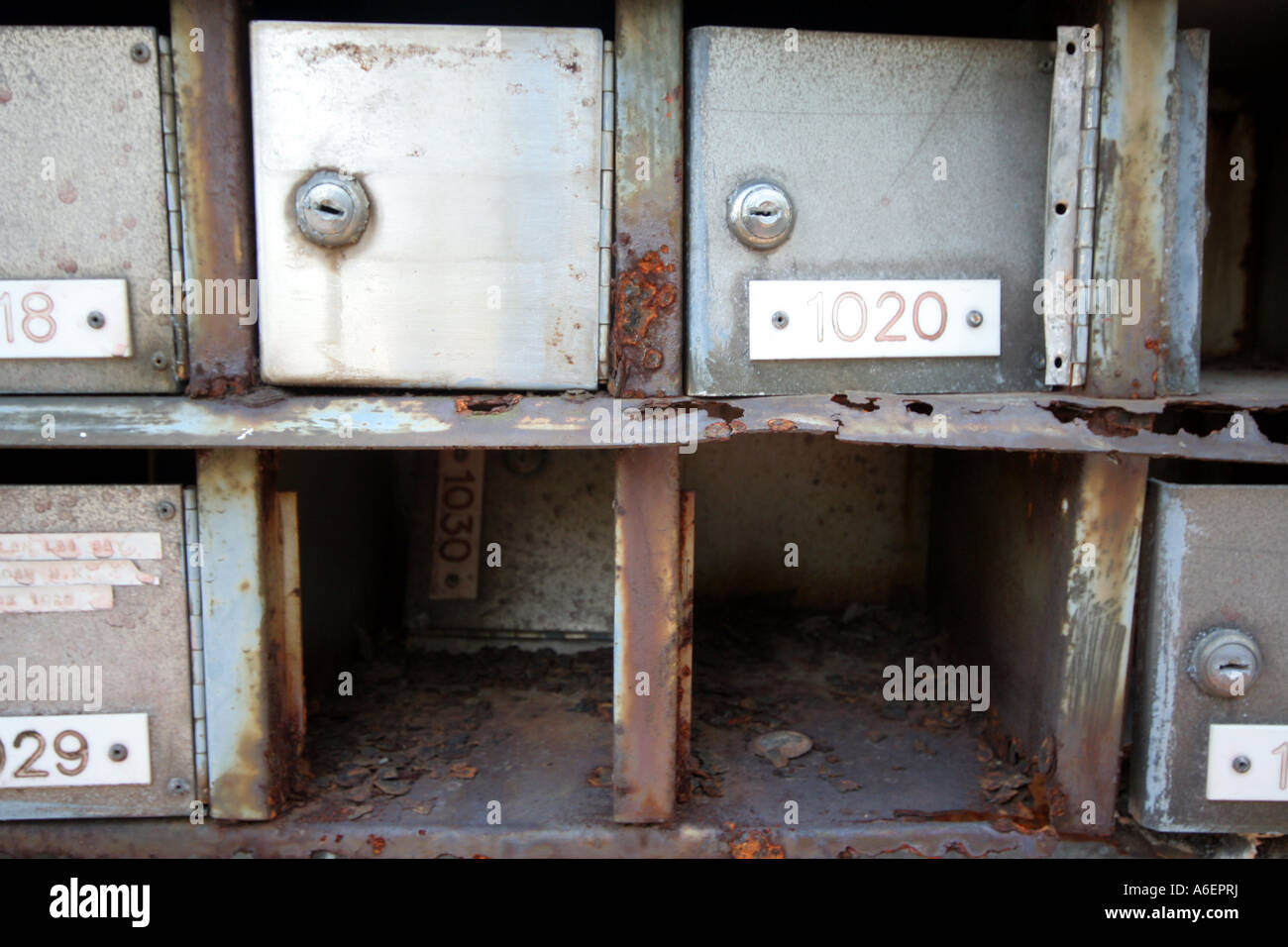 Old letter boxes, some broken Stock Photo - Alamy