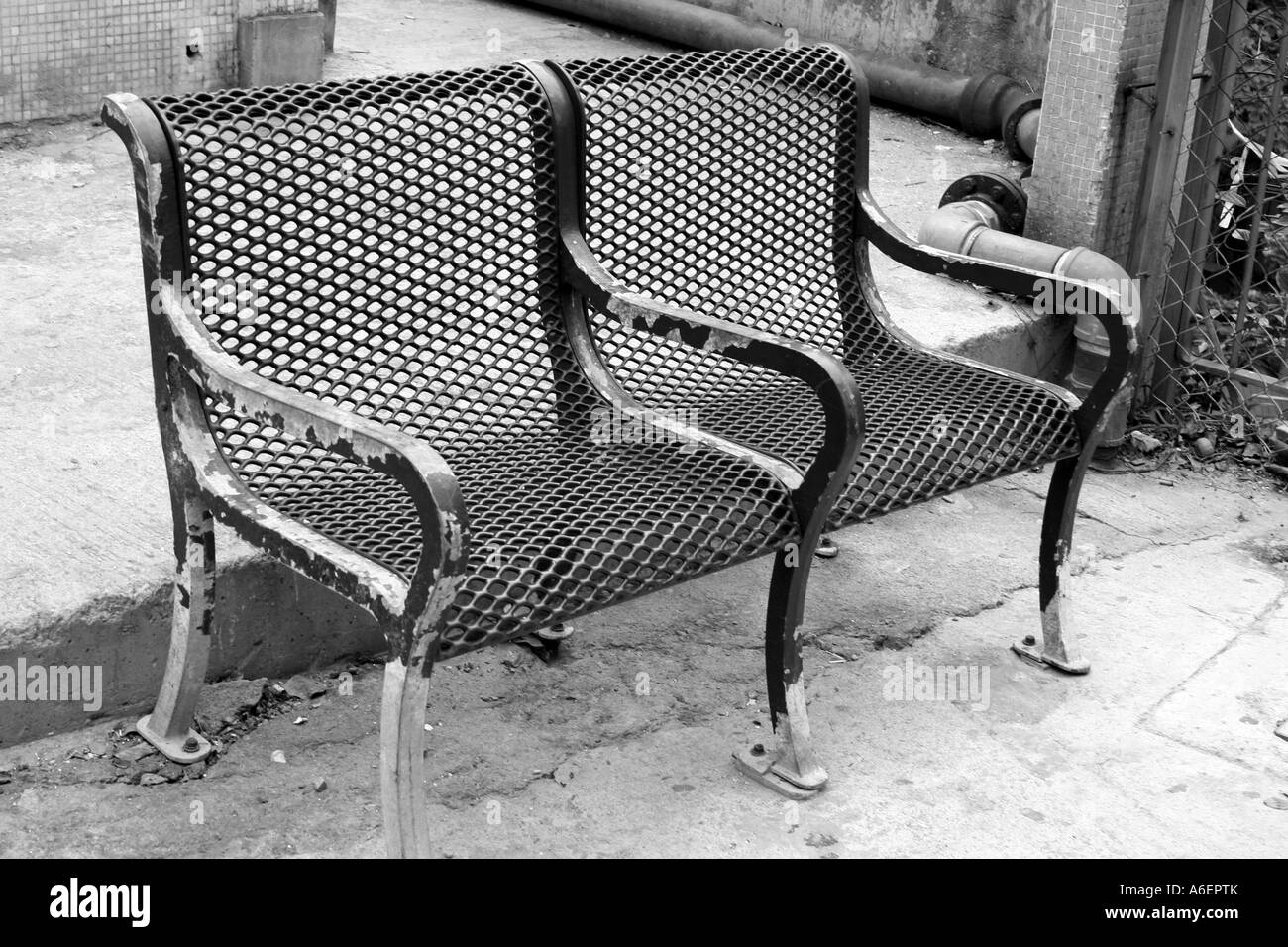 Connected metal chairs Stock Photo - Alamy