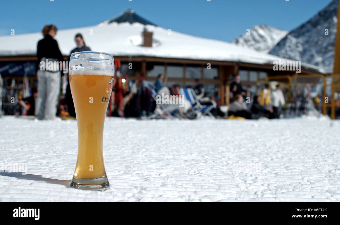 A large glass of beer in the snow at the ski resort of Solden Austria ...