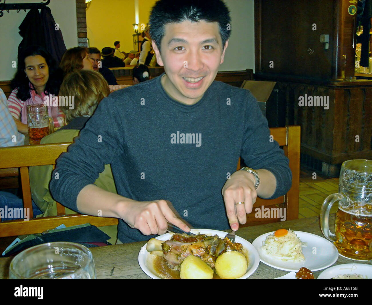 Munich Germany, Chinese male Tourist in German Restaurant Eating asians ...