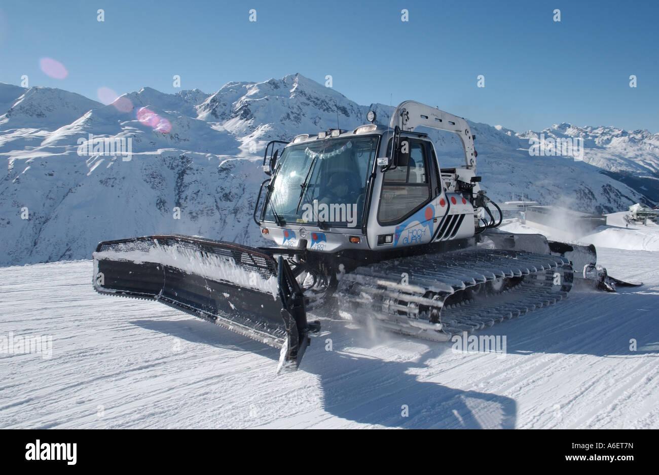 Snow grooming caterpillar tracked vehicle at Hochgurgl ski resort ...