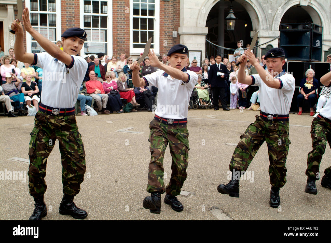 Soldiers from the Gurkha Regiment perform a ritual Nepalese dance at ...